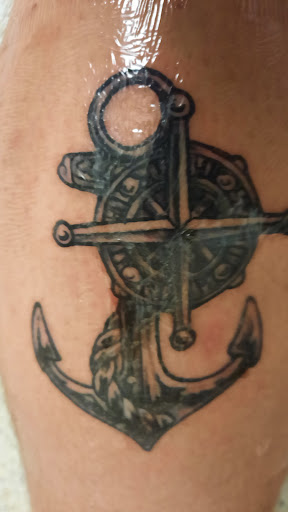 Tattoo Shop «Skin Prints Studio», reviews and photos, 403 S Farwell St ...